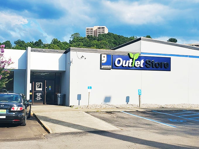 The unassuming exterior of Birmingham's Goodwill Outlet Store—like finding a treasure map disguised as a regular building.
