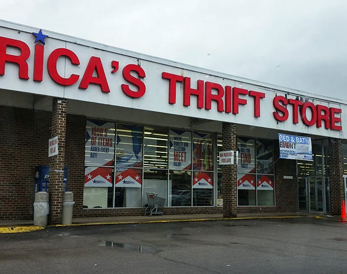 The iconic red signage of America's Thrift Store beckons bargain hunters like a retail lighthouse in a sea of full-priced temptation.