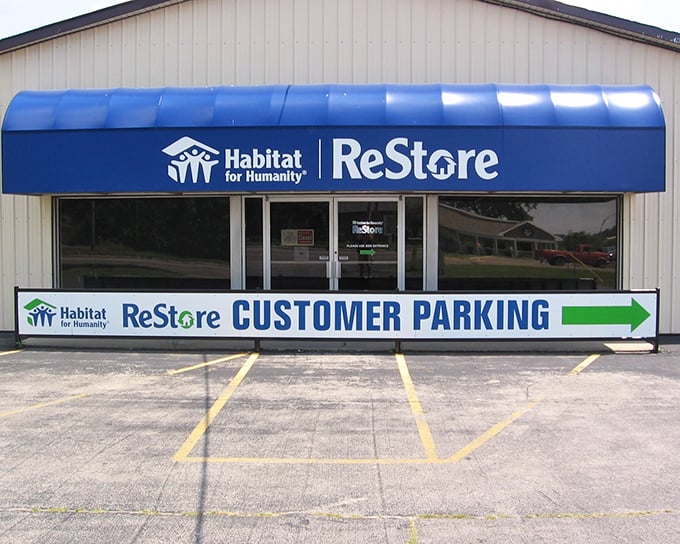 The iconic blue awning of Muncie's Habitat ReStore beckons like a beacon for treasure hunters and DIY dreamers alike.