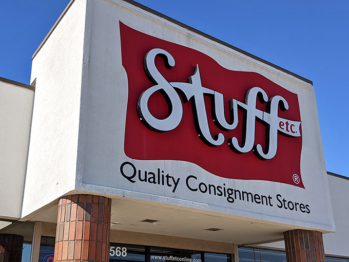 The iconic red Stuff Etc sign stands bold against the Iowa sky, promising treasure hunters hours of secondhand adventures within.