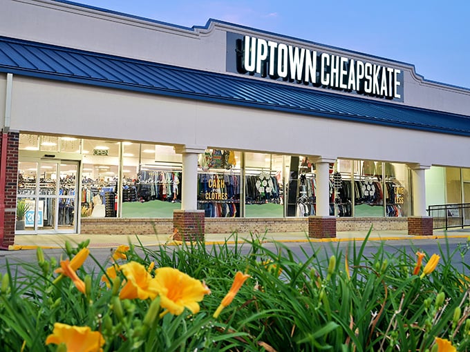 The blue-roofed bargain paradise beckons! Uptown Cheapskate's welcoming storefront promises fashion treasures without the financial regrets.