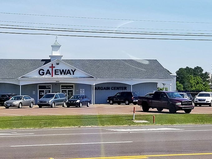 The church-like steeple and cross in Gateway's logo hint at its community mission, while the packed parking lot reveals its not-so-secret popularity.