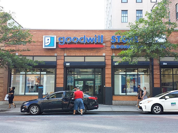 The brick facade of Brooklyn's Goodwill welcomes treasure hunters with its iconic blue signage—urban thrifting's equivalent of finding the entrance to Narnia.