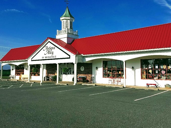 The iconic red-roofed building with its charming cupola stands like a beacon for treasure hunters. You can practically hear it whispering, "Come inside, I've got stories to tell."