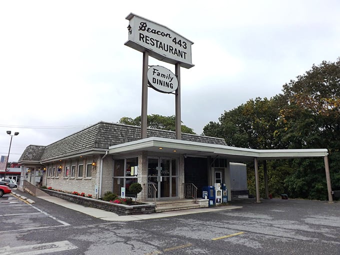 Where breakfast dreams come true! Beacon 443's iconic sign promises "Family Dining" – code for "portions that'll keep you full until dinner" in diner language.