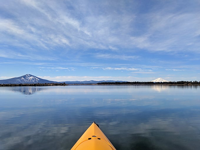Mirror, mirror on the water – pine trees create perfect reflections in the crystal-clear springs that give this hidden California gem its name.