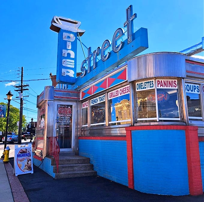 That vintage neon sign isn't just advertising—it's a time machine promising pancakes that would make your grandmother proud.