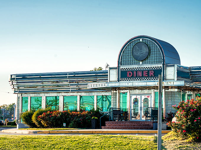 Bathed in golden afternoon light, Boulevard Diner's chrome-and-neon façade stands as a beacon of comfort food promise against Maryland's blue skies.