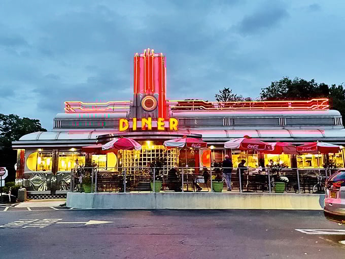 That neon glow isn't just a sign – it's a beacon calling hungry souls home to happiness.