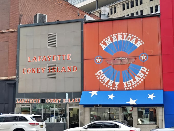 The iconic orange lettering beckons like an old friend. Lafayette Coney Island's unassuming storefront has been Detroit's culinary North Star for generations.