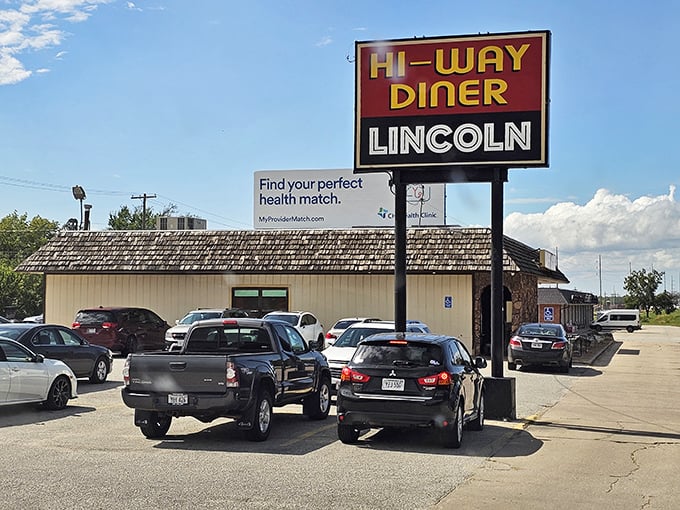 That tall sign isn't just directing traffic—it's been guiding hungry Nebraskans to breakfast salvation for decades.