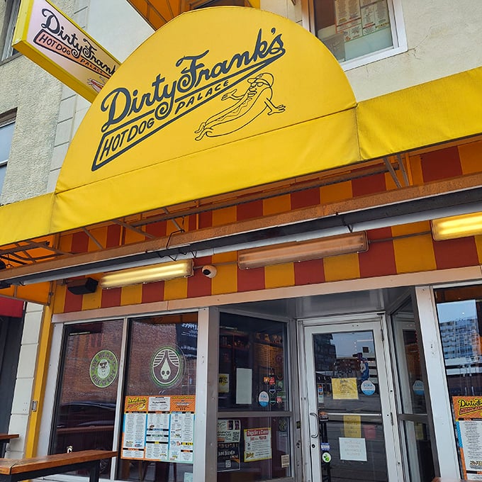 That sunshine-yellow awning isn't just a sign—it's a beacon of hope for hungry souls seeking frankfurter nirvana in downtown Columbus.