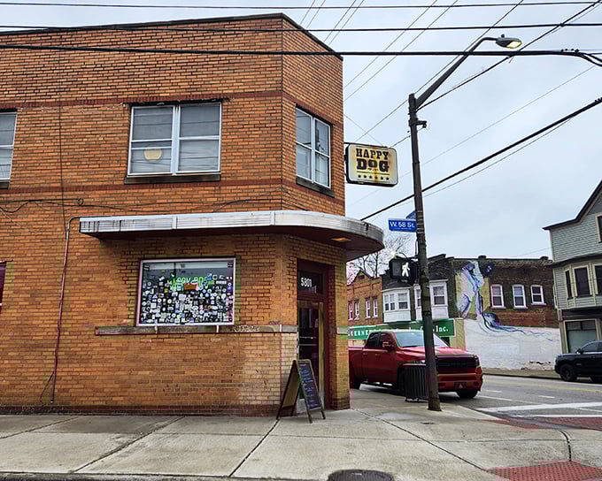 The unassuming entrance to hot dog paradise. Happy Dog's brick exterior and red-trimmed doorway beckon like an old friend with a delicious secret.