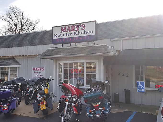 The classic roadside diner dream – Mary's Kountry Kitchen's white exterior with motorcycles parked outside signals you've found where the locals eat.