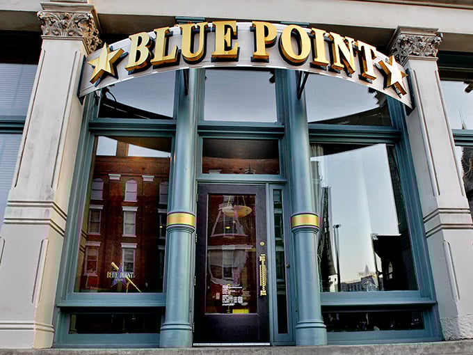 The golden "BLUE POINT" sign beckons seafood lovers like a lighthouse guiding ships to safe harbor. Cleveland's Warehouse District never looked so appetizing.