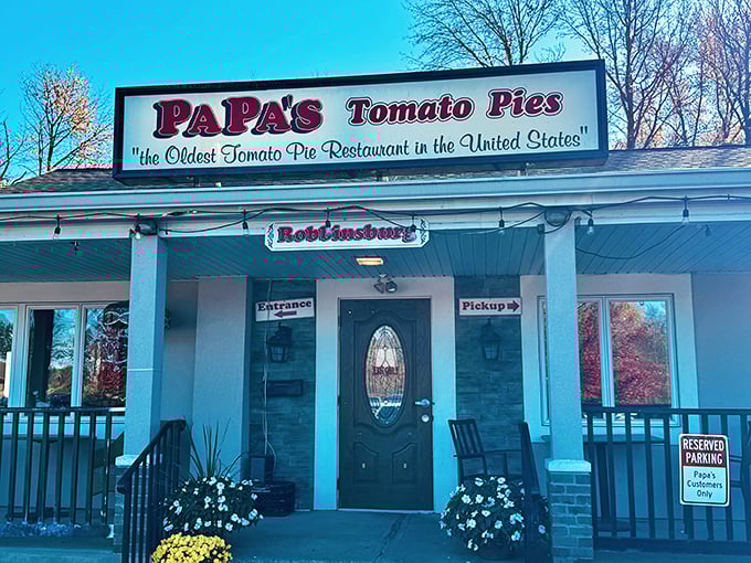 The unassuming storefront that houses pizza history. Papa's proudly declares its heritage with that iconic sign—pizza pilgrims have been making this journey for generations.