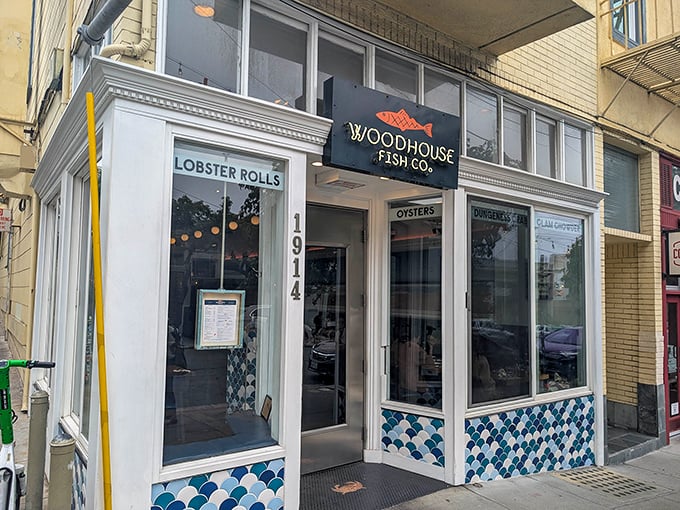 The blue-tiled facade of Woodhouse Fish Co. practically screams "lobster rolls inside!" like a siren call to seafood lovers wandering San Francisco's streets.