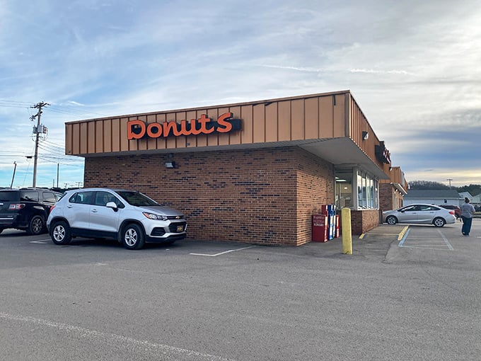 That classic roadside sign isn't just pointing you toward donuts—it's pointing you toward breakfast salvation in Buckhannon.