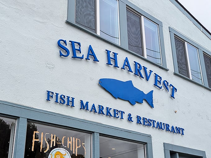 Sea Harvest's blue signage stands out like a beacon for seafood lovers. The fish silhouette isn't false advertising—it's a promise of what awaits inside.