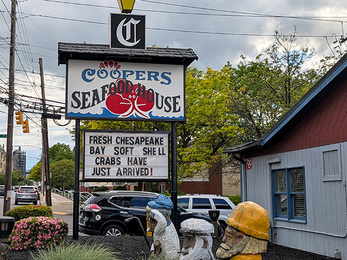 The marquee doesn't lie—those Chesapeake Bay soft shell crabs really have arrived, and they're worth the journey.
