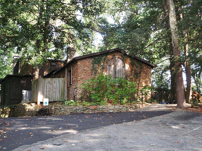 The stone cottage exterior of The Peddler looks like it was plucked from a fairy tale and dropped into Greenville's lush landscape.