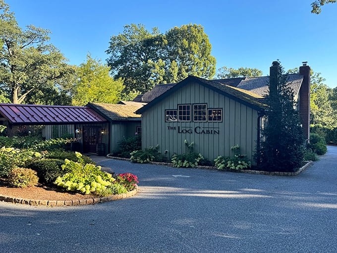 The Log Cabin's exterior is like finding a secret woodland retreat where Paul Bunyan might go for his anniversary dinner. Rustic elegance awaits behind those doors.