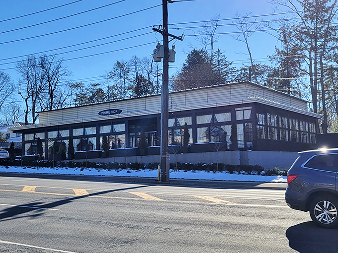 The classic diner silhouette against a winter sky promises comfort food salvation. Like finding an oasis when your stomach's running on empty.