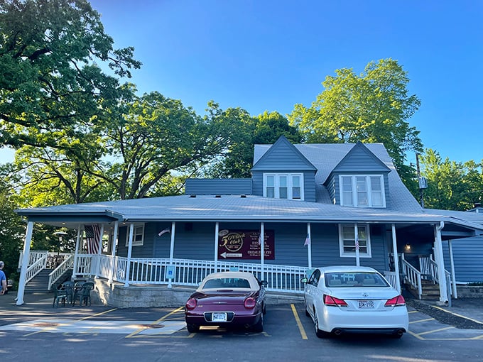 The blue cottage-like exterior of The 5 O'Clock Club welcomes you like an old friend, promising comfort and deliciousness behind its unassuming façade.