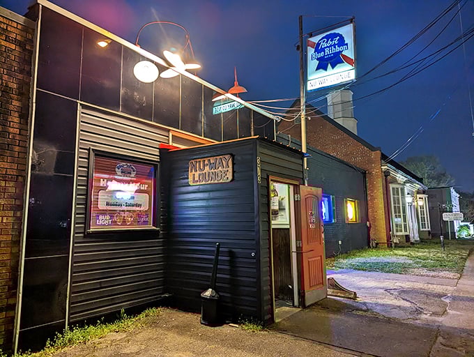 That iconic red door isn't playing hard to get—it's practically winking at you from the street, promising burger nirvana inside.