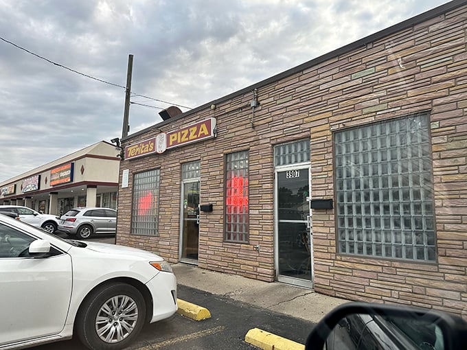 The unassuming stone facade of Terita's Pizza stands as a culinary time capsule on Cleveland Avenue, promising delicious treasures within.