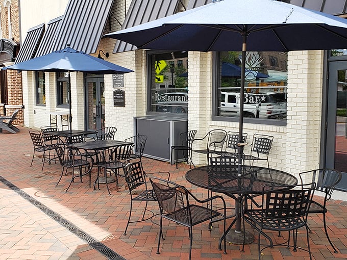Downtown Alpharetta's worst-kept secret beckons with its inviting patio. Those umbrellas aren't just for show—they're sheltering future food comas in the making.