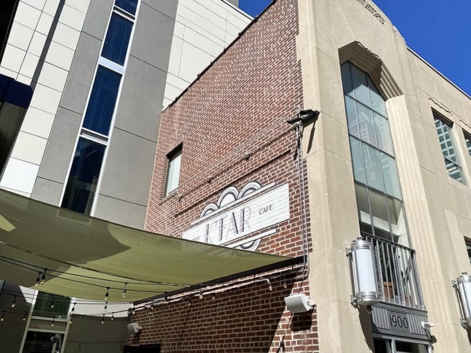 Sunlight plays across K'Far's exterior, where the name (meaning "village" in Hebrew) hints at the community-building power of great food.