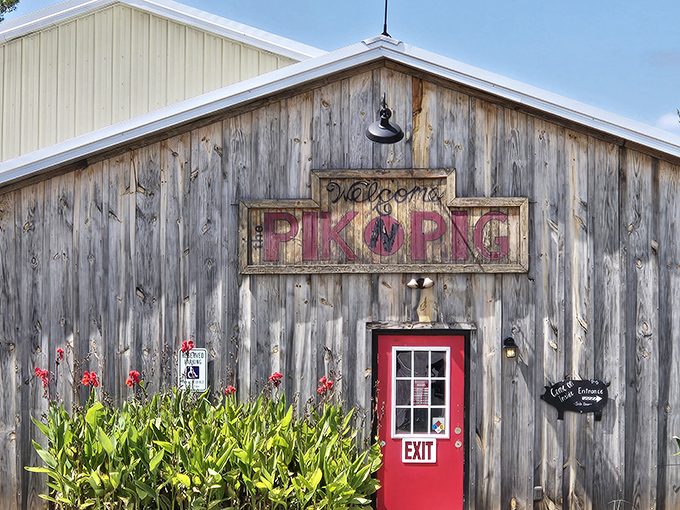 The weathered wooden exterior and bold red sign of Pik N Pig promise authentic barbecue without pretense—like a delicious secret hiding in plain sight.
