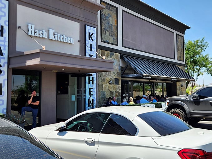 The modern façade might fool you into thinking it's a nightclub, but those morning crowds know better—breakfast paradise awaits behind those doors.