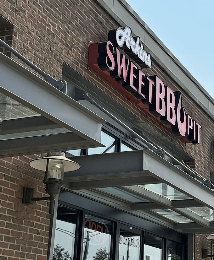 That glowing sign isn't just advertising – it's a beacon calling all serious carnivores home.