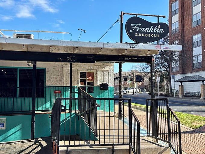 The unassuming turquoise exterior of Franklin Barbecue stands like a beacon of hope for meat lovers. This modest building houses barbecue dreams that are anything but modest.