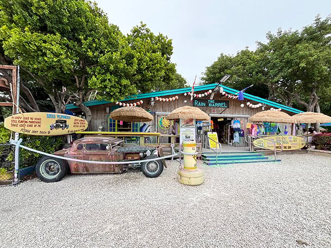 The weathered wooden facade and thatched umbrellas of Rain Barrel Village welcome visitors like an old friend who's dressed a bit eccentrically but always throws the best parties.