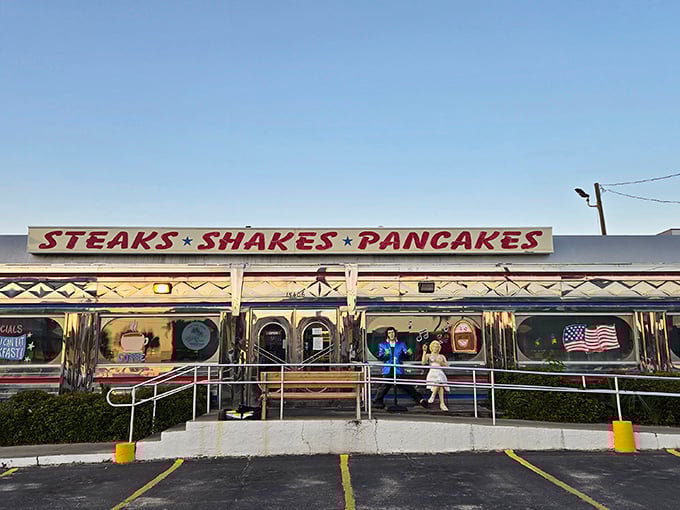 The gleaming chrome exterior of All American Diner catches Florida sunshine like a time machine to simpler days.