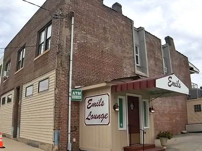 The unassuming brick exterior of Emil's Lounge stands like a culinary speakeasy in Rankin—proof that the best food experiences often hide in plain sight.