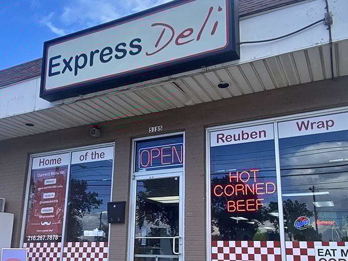 The unassuming storefront that houses sandwich greatness. That red and white checkered trim isn't just decoration—it's a bat signal for sandwich lovers everywhere.