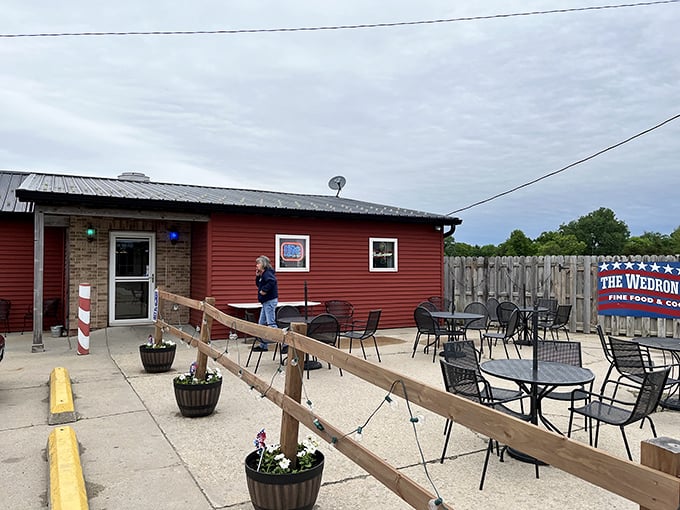 The unassuming red exterior of Wedron Office hides culinary treasures within. Like finding a Picasso at a yard sale, this place delivers unexpected delights.