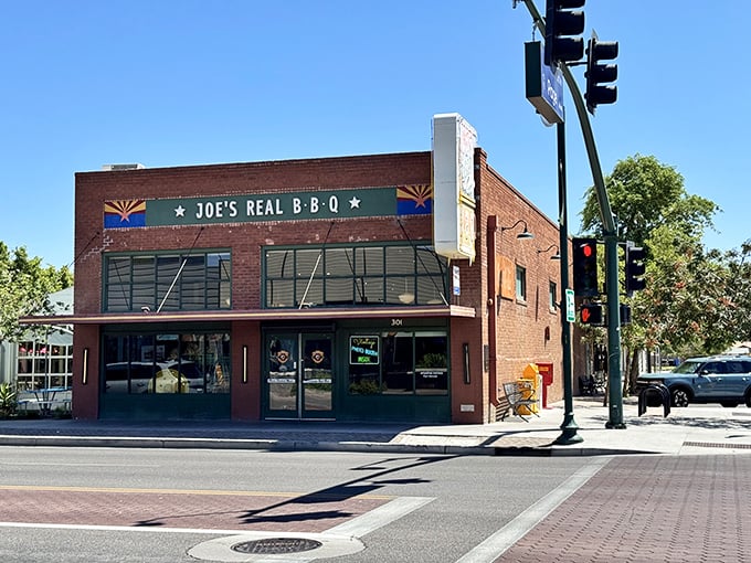 The iconic brick facade of Joe's Real BBQ stands proudly on Gilbert Road, a beacon for smoke-seekers across Arizona.