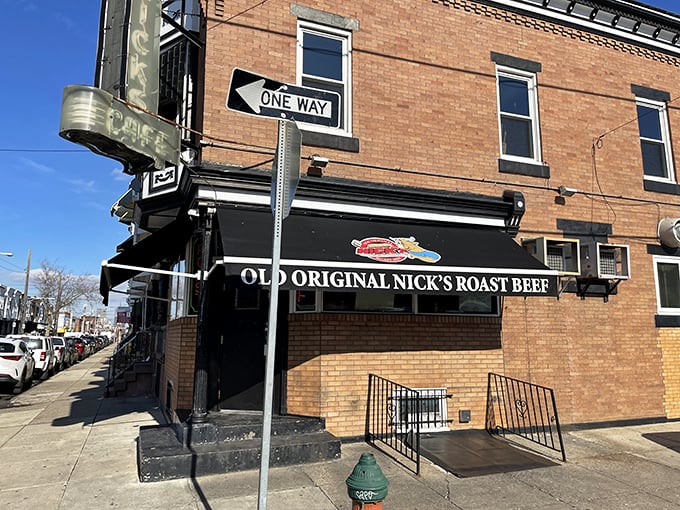 The modest brick façade of Nick’s conceals one of Philadelphia’s most famous “secrets”—a culinary gem hiding in plain sight, like stumbling upon a Picasso at a yard sale.