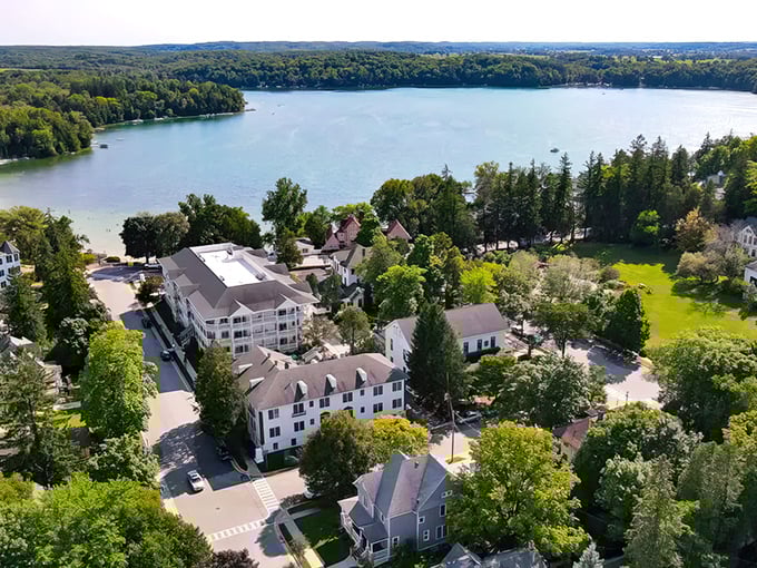 From above, Elkhart Lake reveals its true colors – a shimmering turquoise jewel nestled in Wisconsin's verdant embrace. Paradise found, not manufactured.