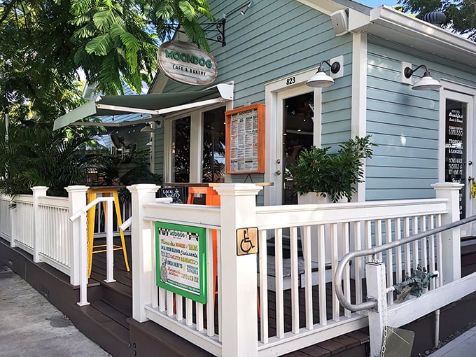 Moondog Cafe's turquoise exterior welcomes you like an old friend, promising culinary treasures behind its charming facade.
