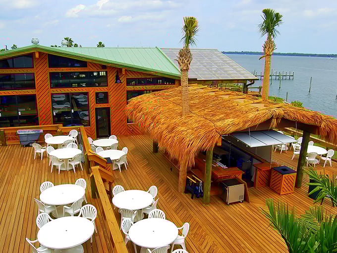 Paradise isn't a place, it's a wooden deck over water with palm trees and a thatched roof where seafood dreams come true.