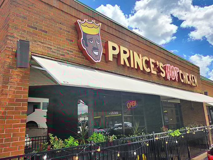 That iconic crown logo isn't just branding—it's a well-earned symbol of royalty in Nashville's culinary landscape. The "OPEN" sign might as well say "Enter at your own delicious risk."