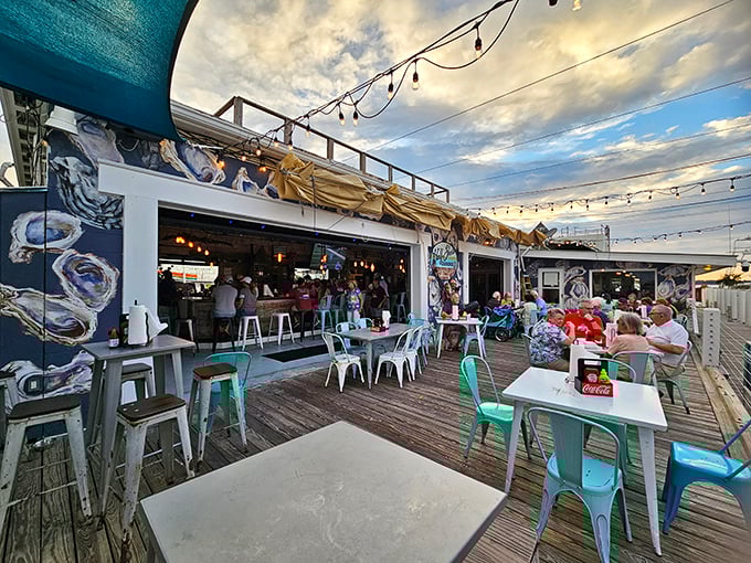 The outdoor deck at Half Shell Dockside—where string lights, sea breezes, and the promise of fresh seafood create Florida dining perfection.