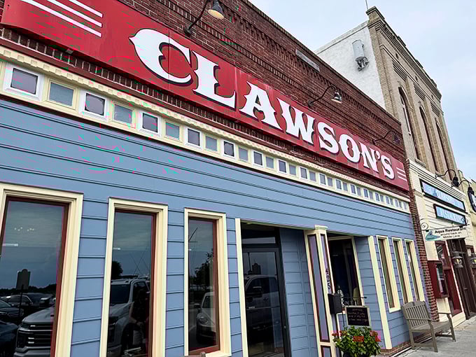 The striking blue facade with crisp white trim stands out on Front Street like a postcard from coastal Carolina come to life.