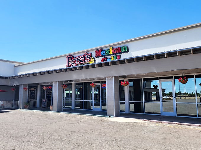 The colorful sign beckons like a desert mirage, promising authentic Mexican flavors behind those unassuming doors. No fancy frills needed when the food speaks volumes.